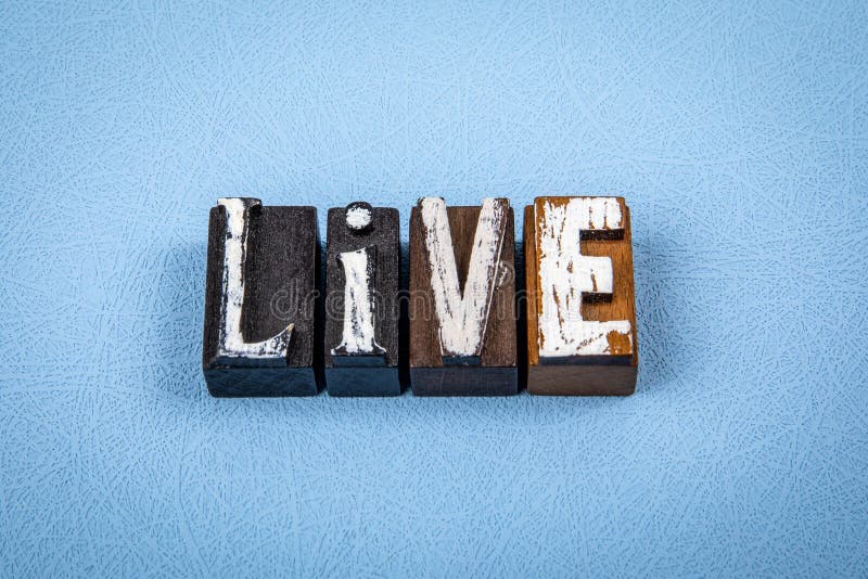 LIVE. Wooden Alphabet Letter Blocks on Blue Textured Background Stock ...