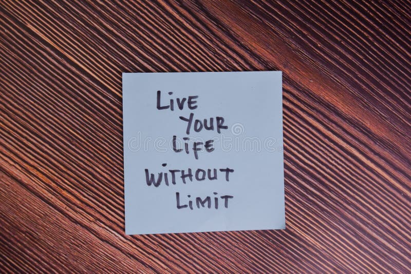 Live Your Life without Limit Write on Sticky Notes Isolated on Wooden ...
