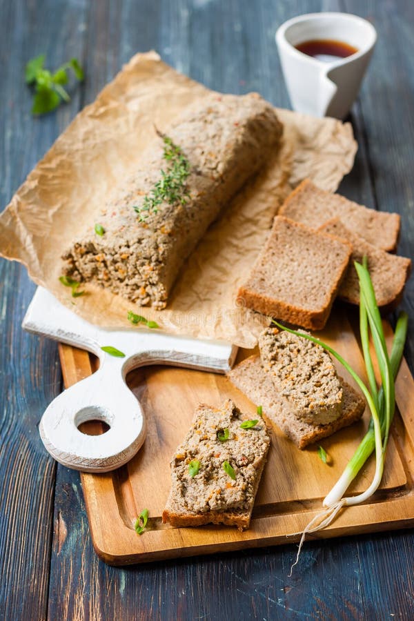 Liver paste on the board. stock photo. Image of herb - 76951772