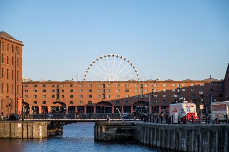 Liverpool Albert Dock with the Wheel of Liverpool in the Background ...