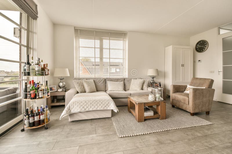 A Living Room with a Couch and a Coffee Table Editorial Photo - Image ...