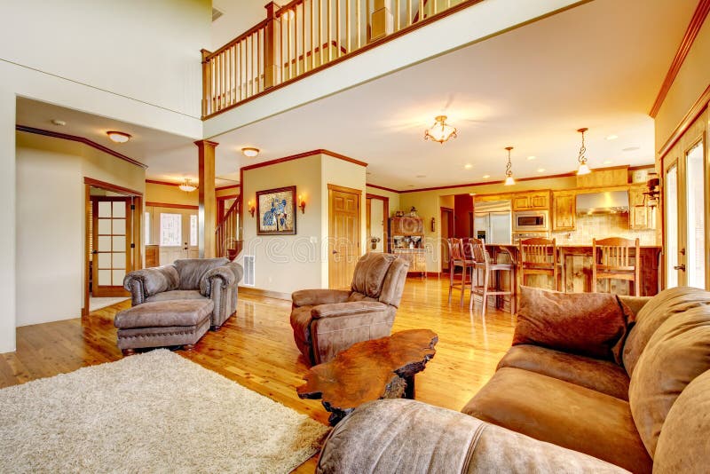 Living Room with High Ceiling, Kitchen and Leather Sofa. Stock Image ...