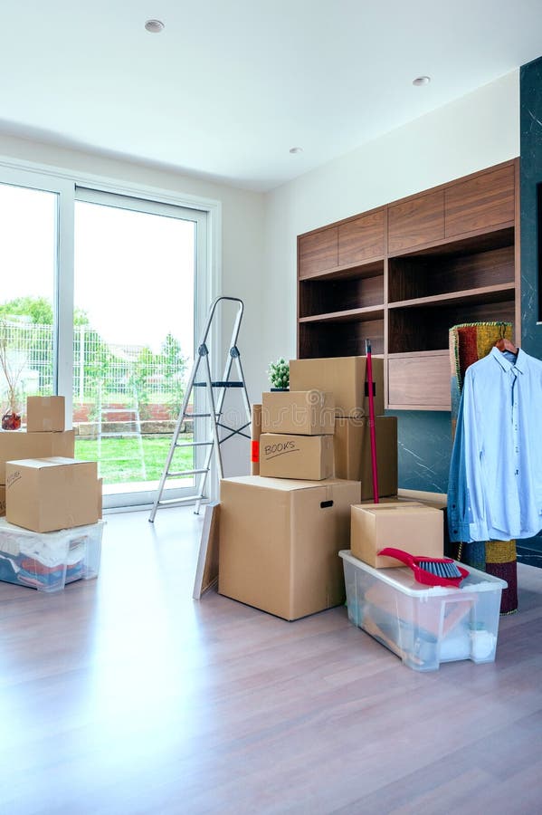 Living Room with Moving Boxes Stock Photo - Image of mortgage, moving ...