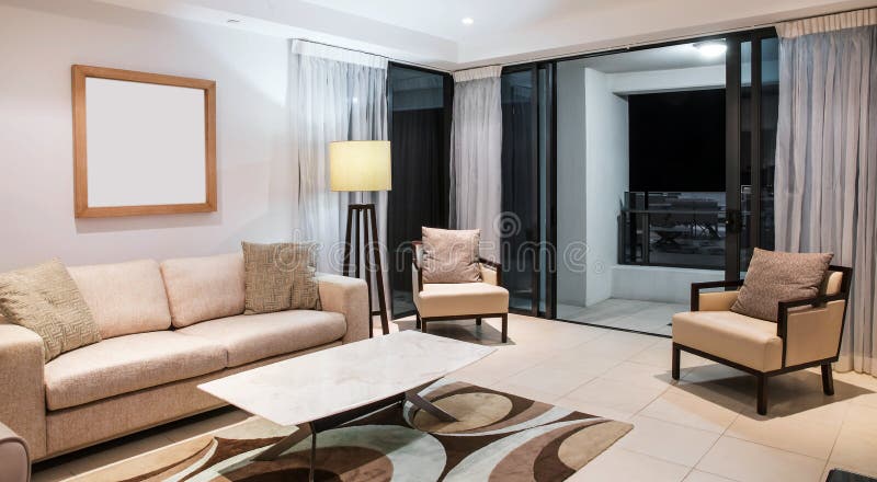 Living Room with Open Doors To a Balcony. Stock Photo - Image of ...