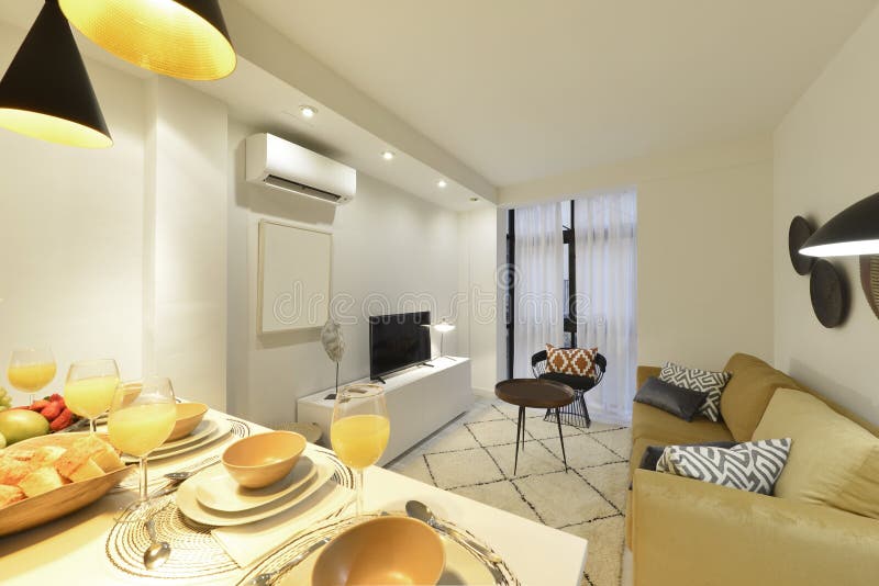 Living Room with Open Kitchen, with White Rectangular Dining Table with ...