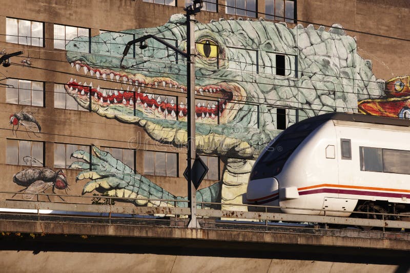 Lizard Graffiti on a Building Facade and Train Editorial Photography ...
