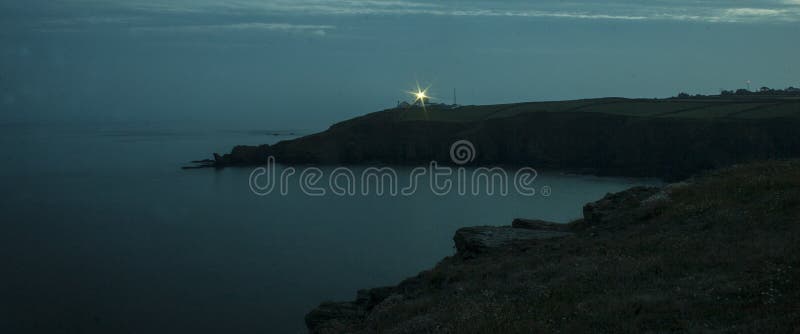 Lizard Point Lighthouse with the Light Illuminated at Sunset Stock ...