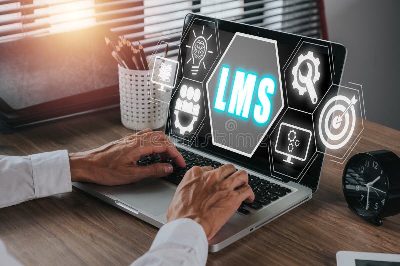 Business Person Using Laptop Computer with LMS Icon on Virtual Screen ...