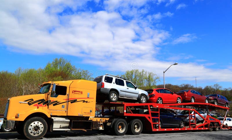 Semi Trailer Truck Hauling Load of Cars Down Road Stock Image - Image ...