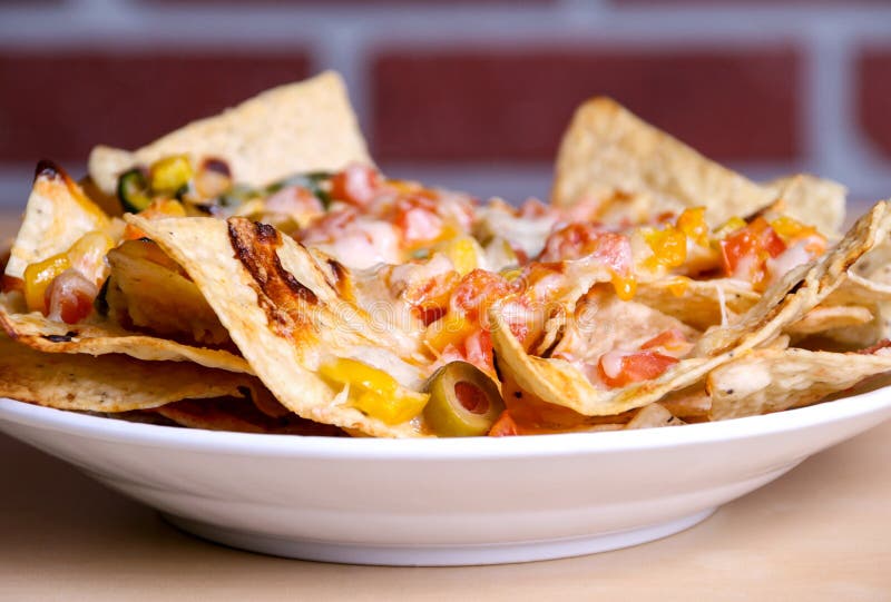 Loaded cheese nacho stock photo. Image of bistro, chip - 86675950
