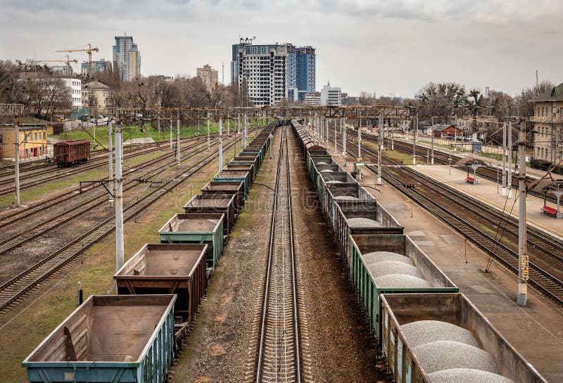 Loaded Freight Trains on the Railway Stock Photo - Image of railing ...