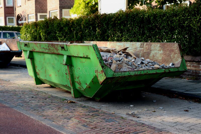 Loaded garbage dumpster stock image. Image of environment - 128128897