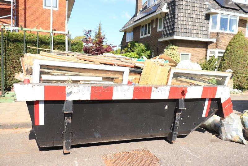 Loaded garbage dumpster stock photo. Image of chute - 186625604