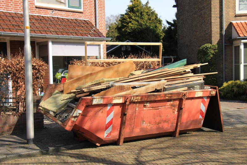 Loaded garbage dumpster stock photo. Image of hire, industrial - 221617866