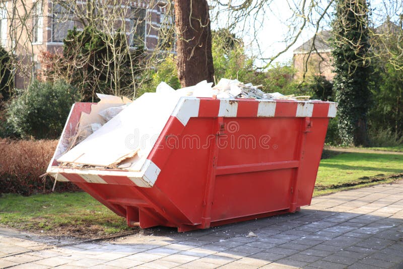 Loaded garbage dumpster stock photo. Image of green - 244630582