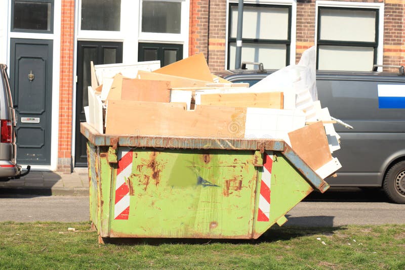 Loaded garbage dumpster stock image. Image of industry - 181572003