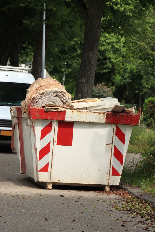 Loaded garbage dumpster stock photo. Image of hire, industrial - 221617866