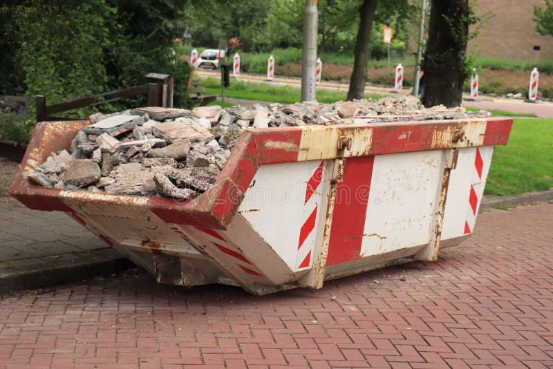 Loaded garbage dumpster stock photo. Image of hire, industrial - 221617866