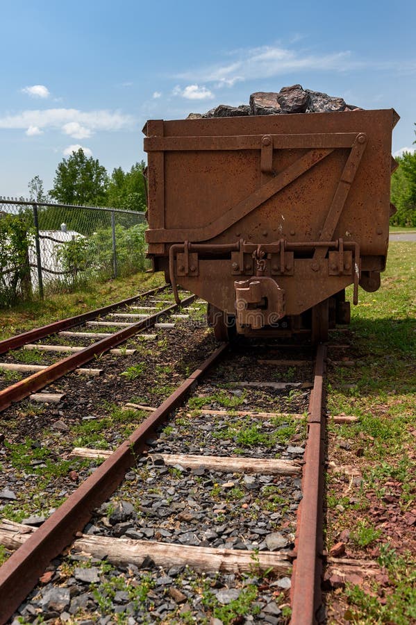 Loaded Ore Cart on Railroad Tracks Stock Photo - Image of steel, head ...