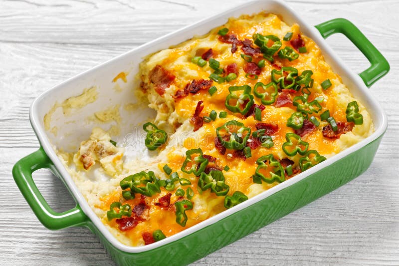 Loaded Smashed Potatoes with Cheese, Bacon, Cream Stock Photo - Image ...