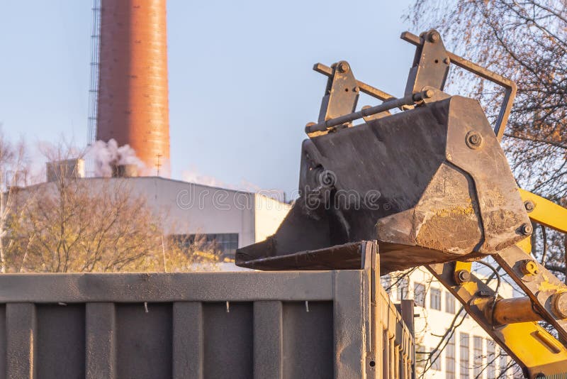 Loader Bucket Loads into the Back of the Truck Stock Image - Image of ...