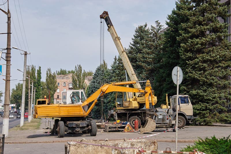 Loader Excavator and Mobile Crane Editorial Photo - Image of heavy ...