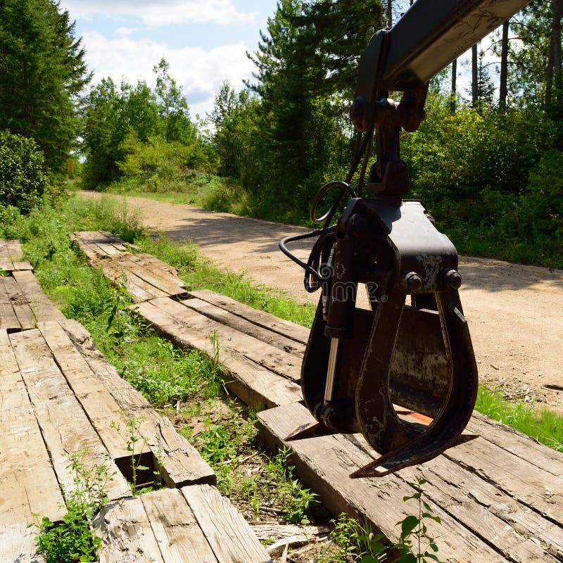 Loader Grapple on Log Deck stock image. Image of slasher - 59499601