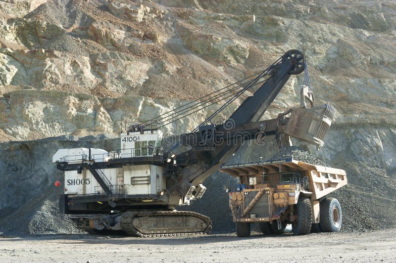 Loader and Haul Truck at the Opencast Mining Stock Image - Image of ...