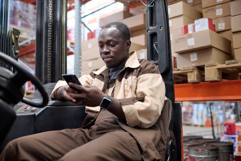 Loader Man Using Mobile Phone at Work Stock Image - Image of play ...