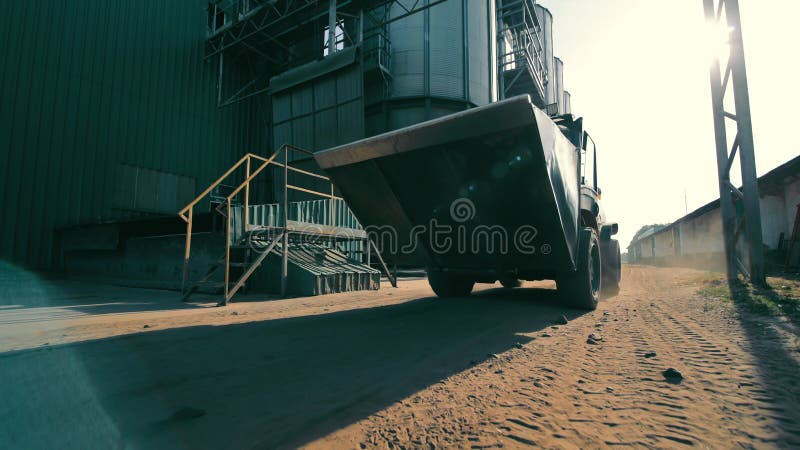 Loader Moving at Industrial Facility, a Large Loader is Moving through ...