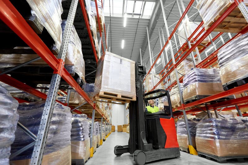 Loader Operating Forklift at Warehouse Stock Image - Image of depot ...