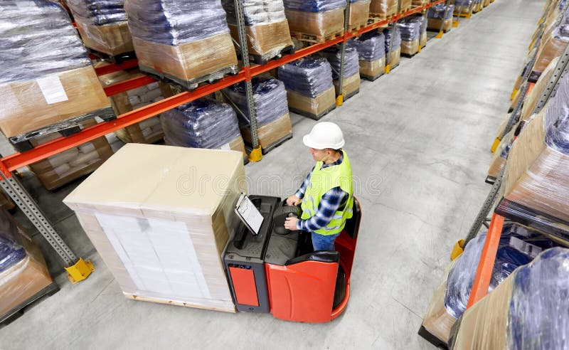 Loader Operating Forklift at Warehouse Stock Photo - Image of driver ...