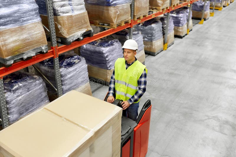 Man Operating Forklift Loader at Warehouse Stock Photo - Image of ...