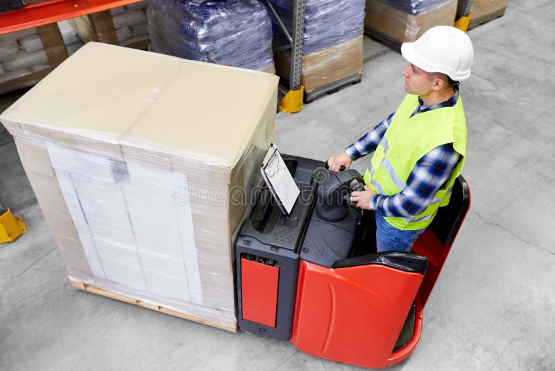 Loader Operating Forklift at Warehouse Stock Image - Image of hardhat ...