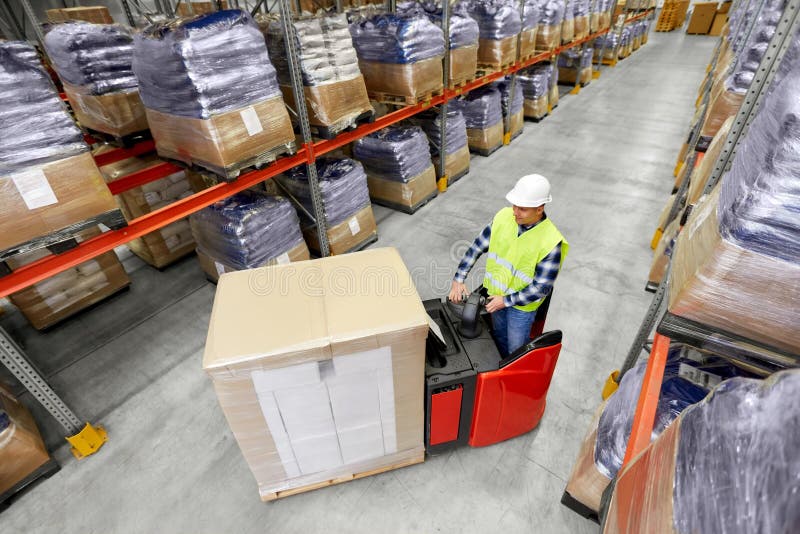 Loader Operating Forklift at Warehouse Stock Image - Image of operator ...