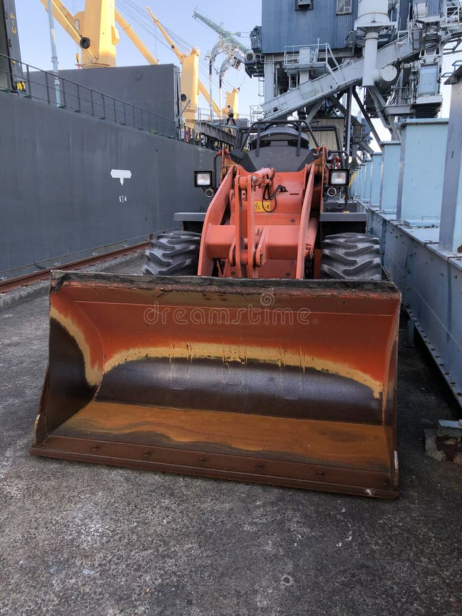 A loader at port stock photo. Image of boat, port, iron - 239606406