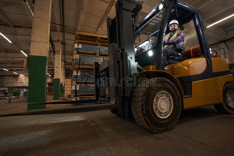 Loader Sitting in Car and Preparing To Load Materials Stock Photo ...