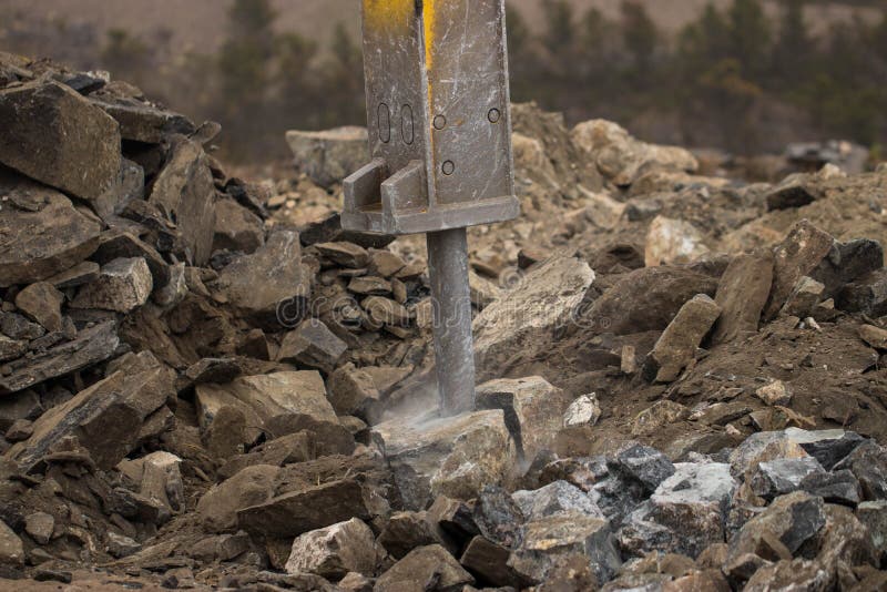 Hammer Smashing Rock