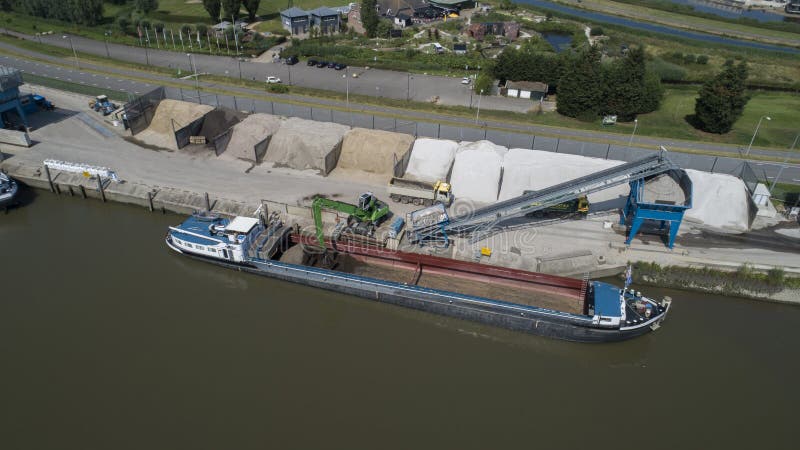 Loading Barge with Sand and Rubble on a Small Berth. Freight Transport ...