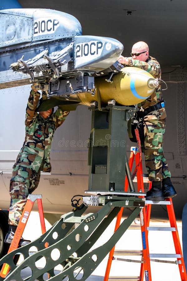 Loading Bombs on B-52 Bomber Editorial Photography - Image of bomb ...