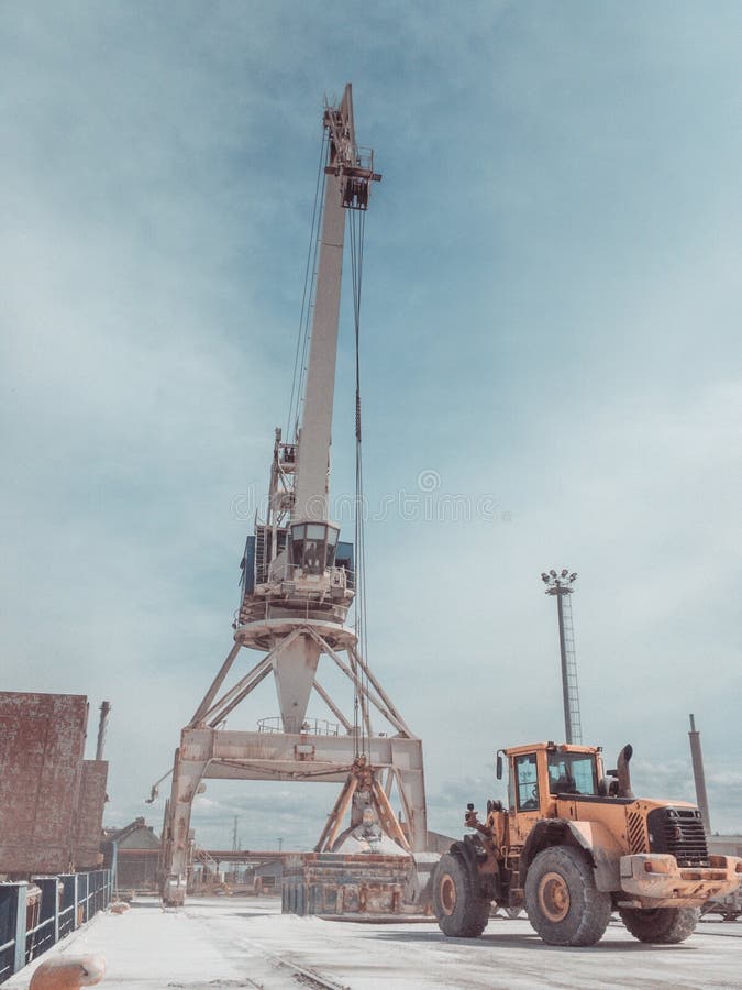Loading Bulk Cargo into the Hold of a Bulk Carrier in the Port Stock ...