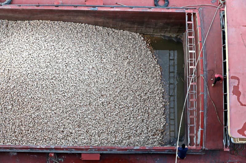 Loading Bulk Cargo of Limestone from Barges into a Bulk Carrier by ...
