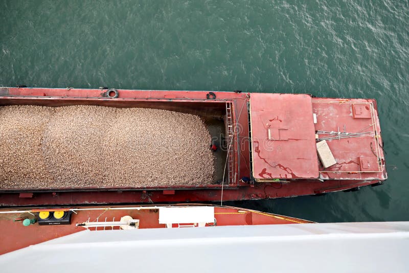Loading Bulk Cargo of Limestone from Barges into a Bulk Carrier by ...