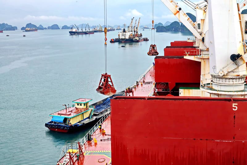 Loading Bulk Cargo of Limestone from Barges into a Bulk Carrier by ... Loading Bulk Cargo of Limestone from Barges into a Bulk Carrier by ...