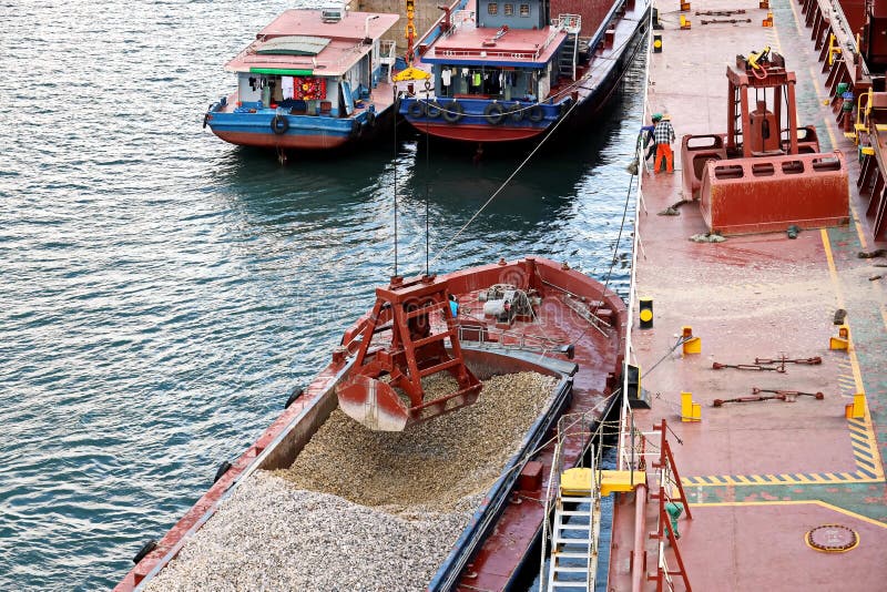 Loading Bulk Cargo of Limestone from Barges into a Bulk Carrier by ...