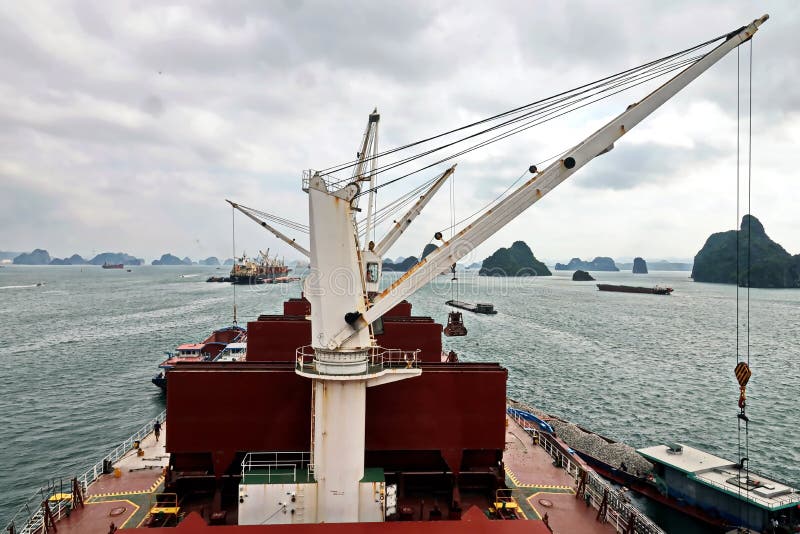 Loading Bulk Cargo of Limestone from Barges into a Bulk Carrier by ... Loading Bulk Cargo of Limestone from Barges into a Bulk Carrier by ...