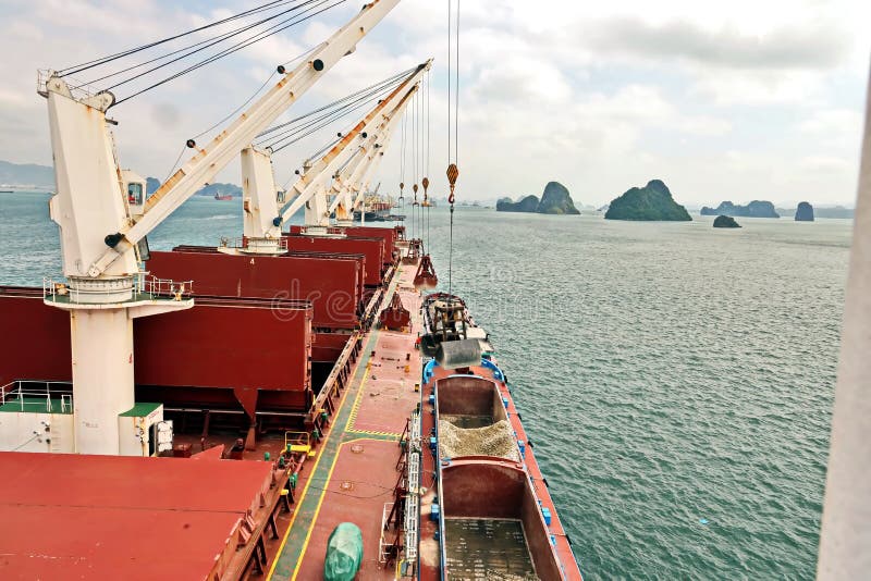 Loading Bulk Cargo of Limestone from Barges into a Bulk Carrier by ...