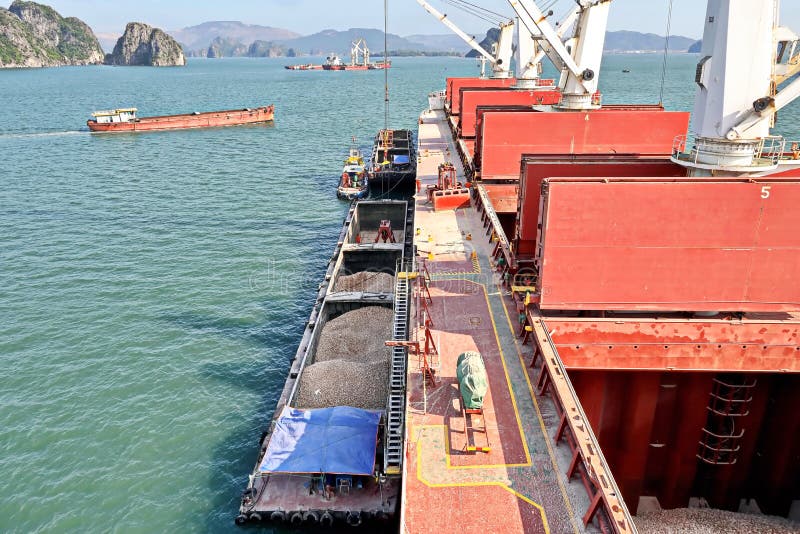 Loading Bulk Cargo of Limestone from Barges into a Bulk Carrier by ...