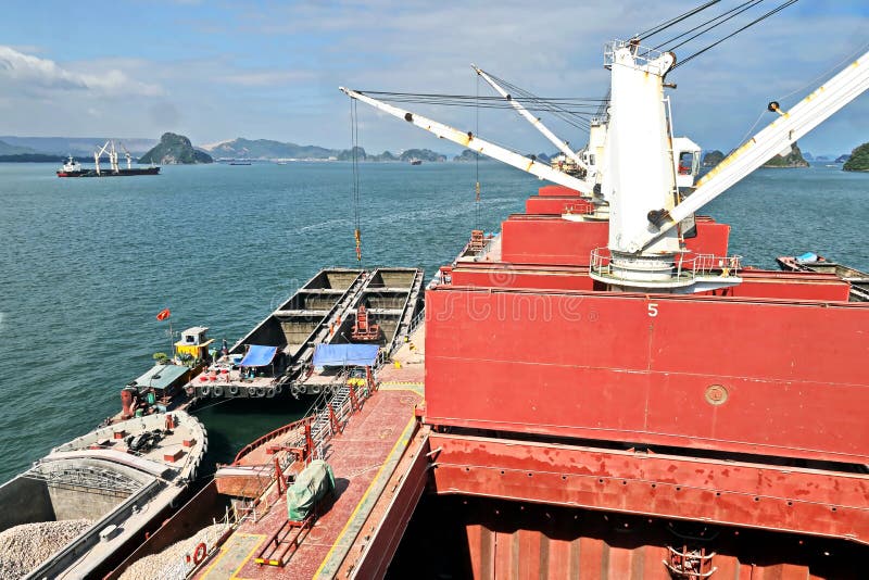 Loading Bulk Cargo of Limestone from Barges into a Bulk Carrier by ... Loading Bulk Cargo of Limestone from Barges into a Bulk Carrier by ...