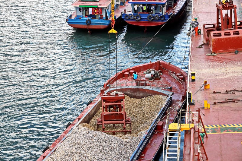 Loading Bulk Cargo of Limestone from Barges into a Bulk Carrier by ...